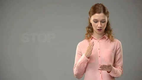 Woman saying stop in sign language, text... | Stock Video | Pond5