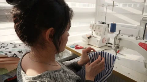 Woman Sew Working on Electric Sewing Mac... | Stock Video | Pond5