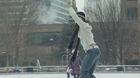 A woman skating at a busy ice rink | Stock Video | Pond5