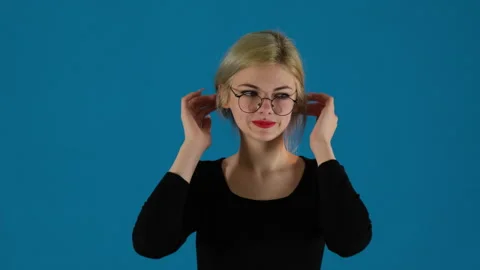 Woman spreads hands with bewildered look... | Stock Video | Pond5