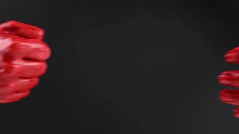 A woman stained with blood hits her palm... | Stock Video | Pond5