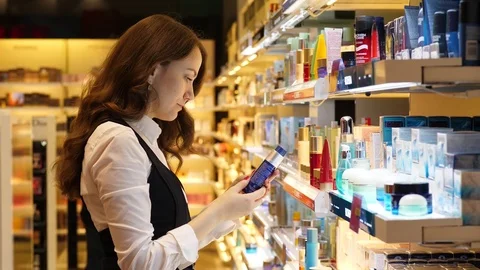 Woman stand against skin care products o... | Stock Video | Pond5