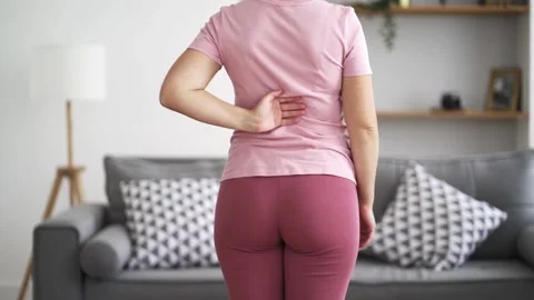Woman suffering from back ache pain musc... | Stock Video | Pond5
