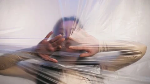 Woman suffocates in plastic. | Stock Video | Pond5