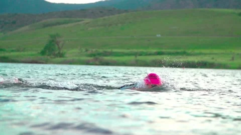 Woman swimming in the river. Freestyle s... | Stock Video | Pond5