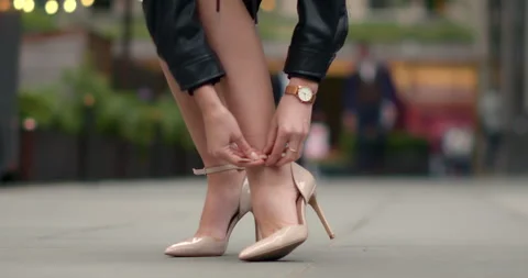 Woman Taking Off High Heels in New York ... | Stock Video | Pond5