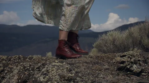 Woman tap dancing on rock in flowing ski... | Stock Video | Pond5