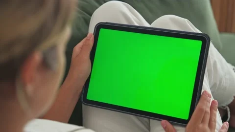 Woman tap tablet green screen. Horizonta... | Stock Video | Pond5