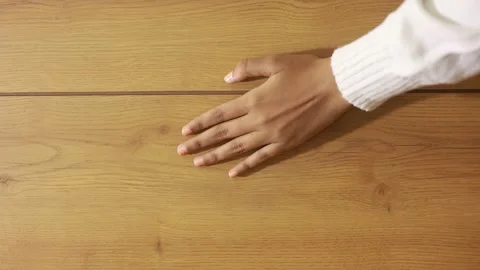 woman touching a wooden surface in house... | Stock Video | Pond5