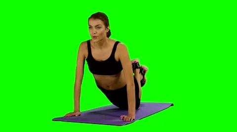 woman in a traditional yoga pose, Green ... | Stock Video | Pond5