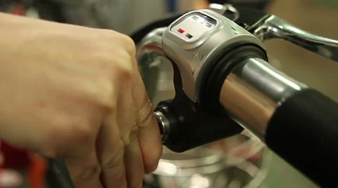 Woman turning key to start and stop moto... | Stock Video | Pond5