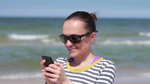 Woman typing chat message on cell phone ... | Stock Video | Pond5