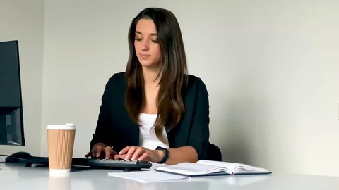 Woman typing text, drink coffee and has ... | Stock Video | Pond5