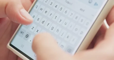 Woman typing a text message on her smart... | Stock Video | Pond5