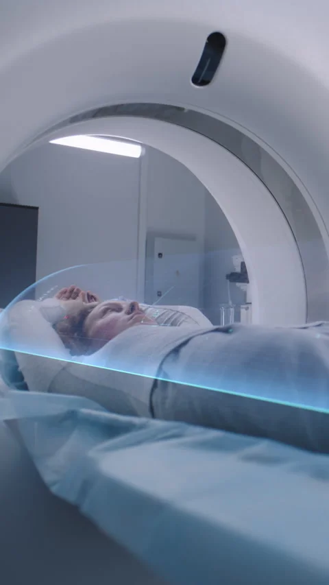 Woman undergoes MRI or CT scan diagnosti... | Stock Video | Pond5