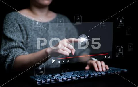 Woman using computer keyboard for streaming on virtual screen, watching ...
