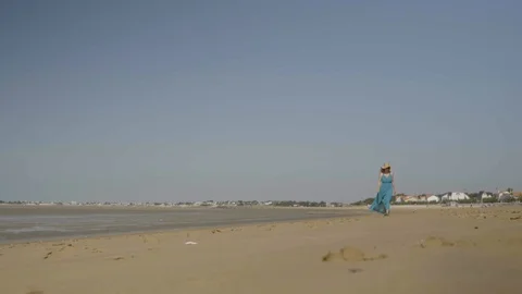 Woman walking on the beach | 4K - NORMAL... | Stock Video | Pond5