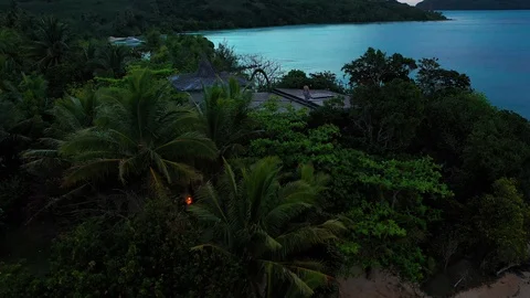 Woman walking out of a hut towards a stu... | Stock Video | Pond5