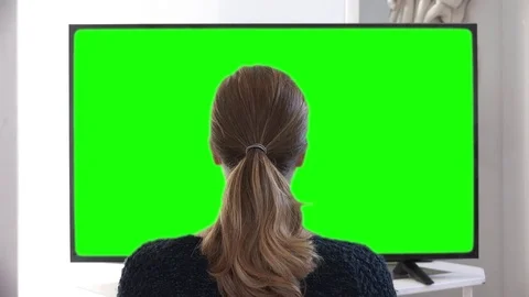 Woman Watching Big Screen Tv, Green Scre... | Stock Video | Pond5