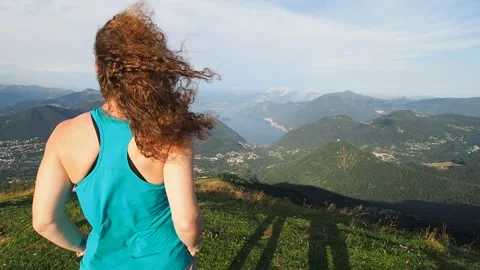 Woman watching the landscape of Lake Com... | Stock Video | Pond5