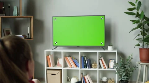 Woman watching television with chroma gr... | Stock Video | Pond5