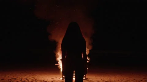 Woman Watching Tiny House Burn | Stock Video | Pond5