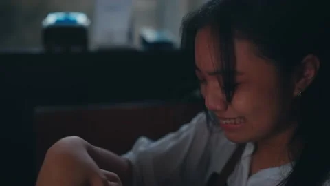 a woman who was crying under the table b... | Stock Video | Pond5