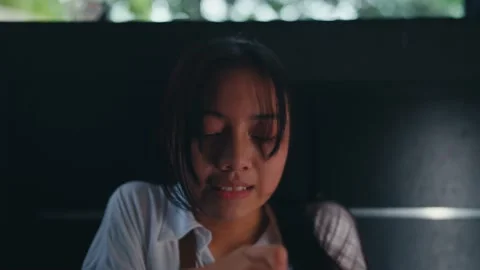 a woman who was crying under the table b... | Stock Video | Pond5