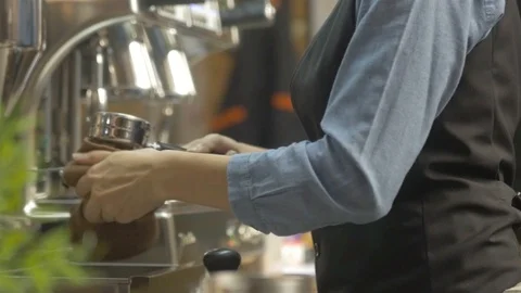 woman wiping the lever of coffee machine... | Stock Video | Pond5
