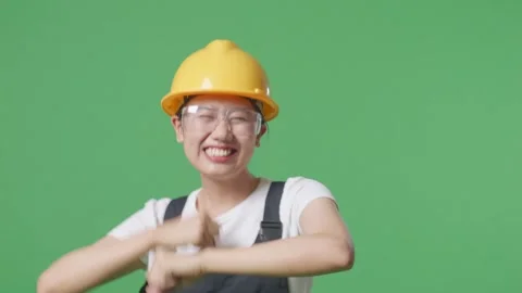 Woman Worker Goggles And Safety Singing ... | Stock Video | Pond5