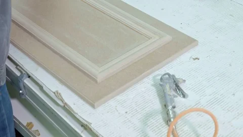 a woman, a worker, spat the door surface... | Stock Video | Pond5