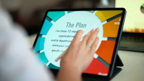 Woman working on apple ipad pro with cha... | Stock Video | Pond5