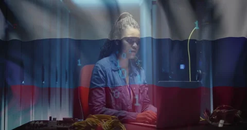 Woman working on laptop with binary code... | Stock Video | Pond5