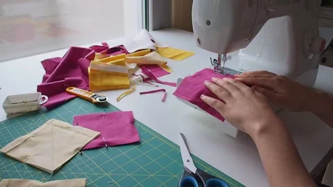 Woman working on sewing machine, messy w... | Stock Video | Pond5