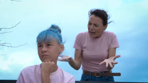 Woman yelling at girl on beach. | Stock Video | Pond5