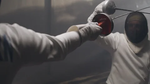 Woman's fencing practicing strikes with ... | Stock Video | Pond5