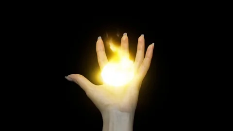 Woman's hand with orange fire in the mid... | Stock Video | Pond5