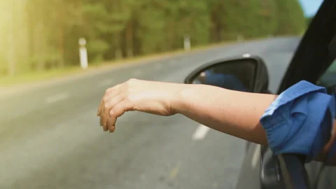 Woman's hand outside car window. Summer ... | Stock Video | Pond5