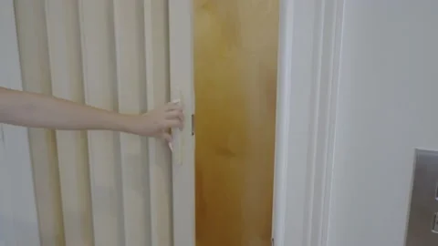 Woman's hand pull up sliding door to bat... | Stock Video | Pond5