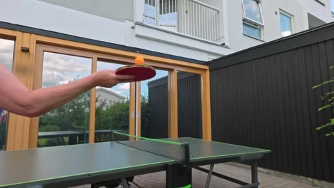 Woman's hand repeatedly hitting the ball... | Stock Video | Pond5