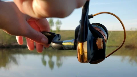 Hand Fishing Reel Stock Footage ~ Royalty Free Stock Videos | Pond5
