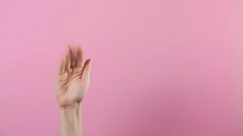 A woman's hand waves her hand in a gestu... | Stock Video | Pond5