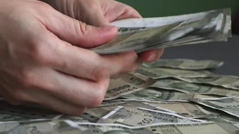 Woman's hands counting brand new indian ... | Stock Video | Pond5