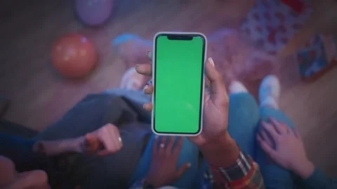 A woman's hands holding green screen pho... | Stock Video | Pond5