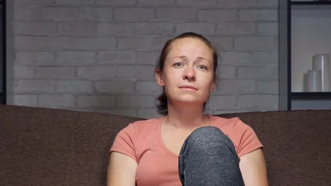 Woman's reaction to the shocking moment ... | Stock Video | Pond5