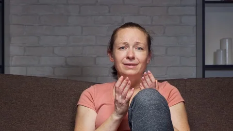 Woman's reaction to the shocking moment ... | Stock Video | Pond5