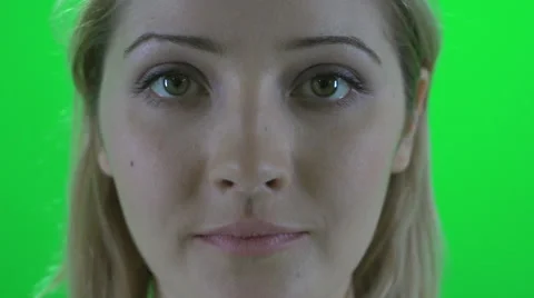 women facing camera close up against gre... | Stock Video | Pond5