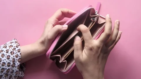 women hand open an empty wallet on pink ... | Stock Video | Pond5