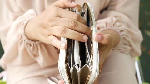 women hand open an empty wallet on pink ... | Stock Video | Pond5