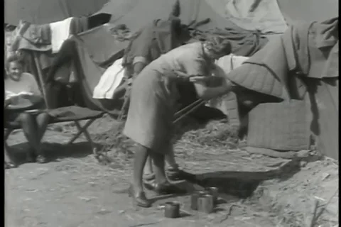 Women prisoners of war washing hair in t... | Stock Video | Pond5